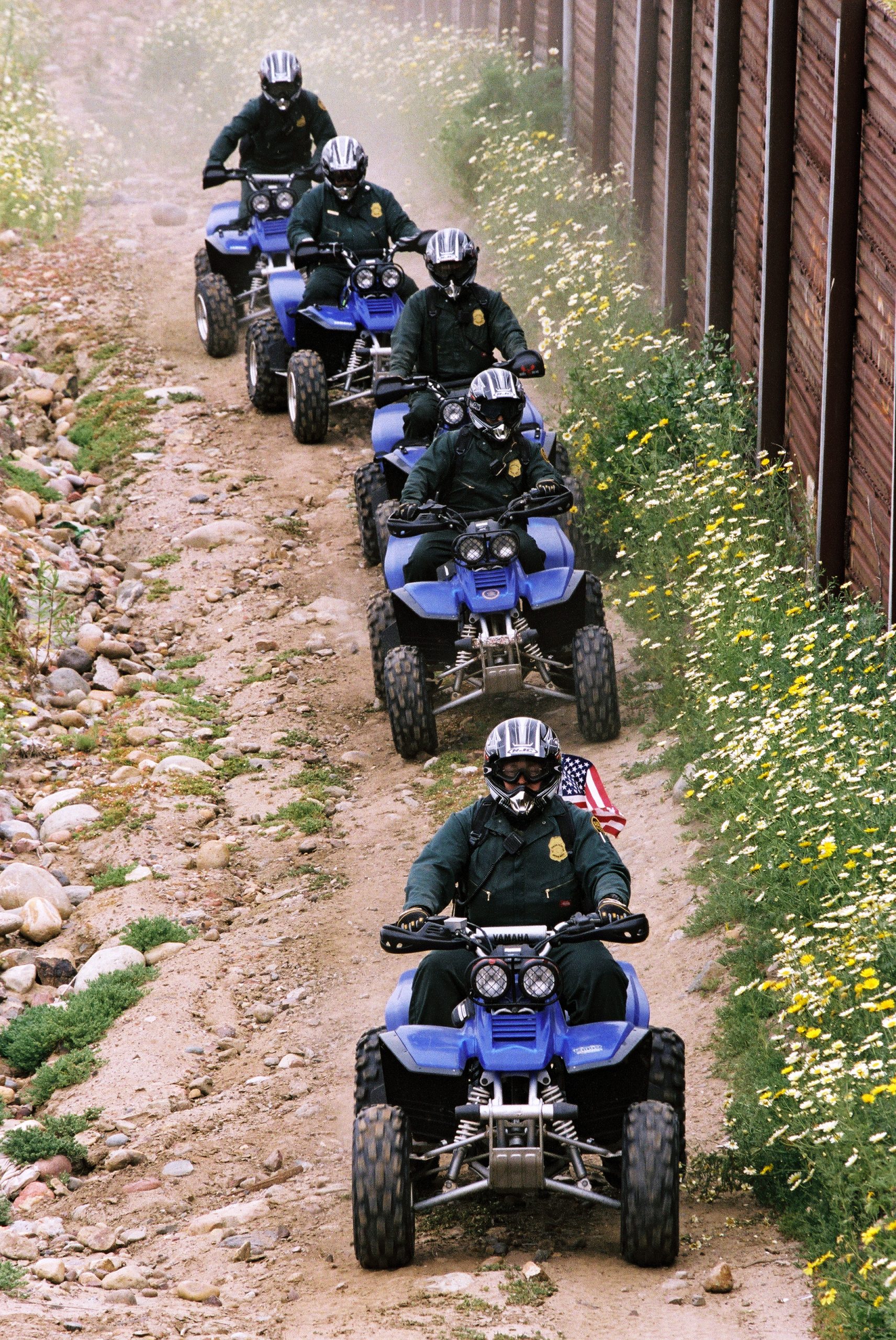 Border Patrol officers makes use of All Terrain Vehicles to patrol ...